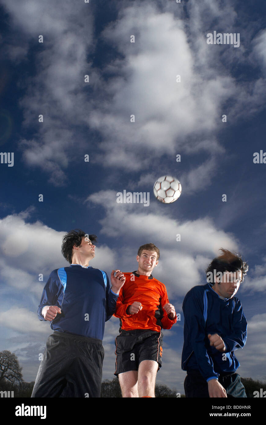 footballer winning header Stock Photo - Alamy