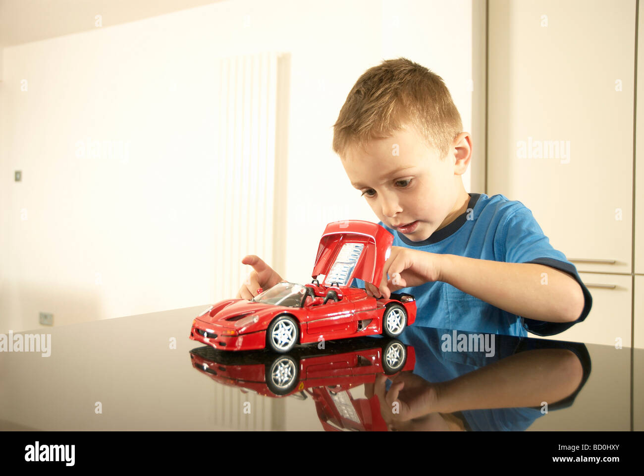 boy with car Stock Photo - Alamy