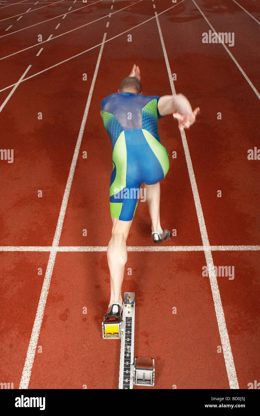 rear view of athlete at start Stock Photo - Alamy