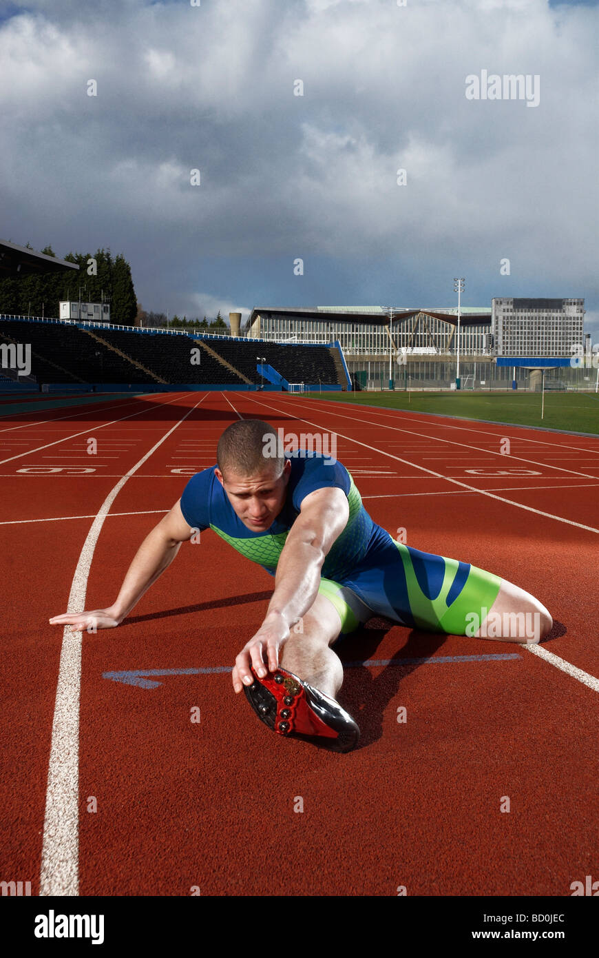Man track stretching arms hi-res stock photography and images - Alamy