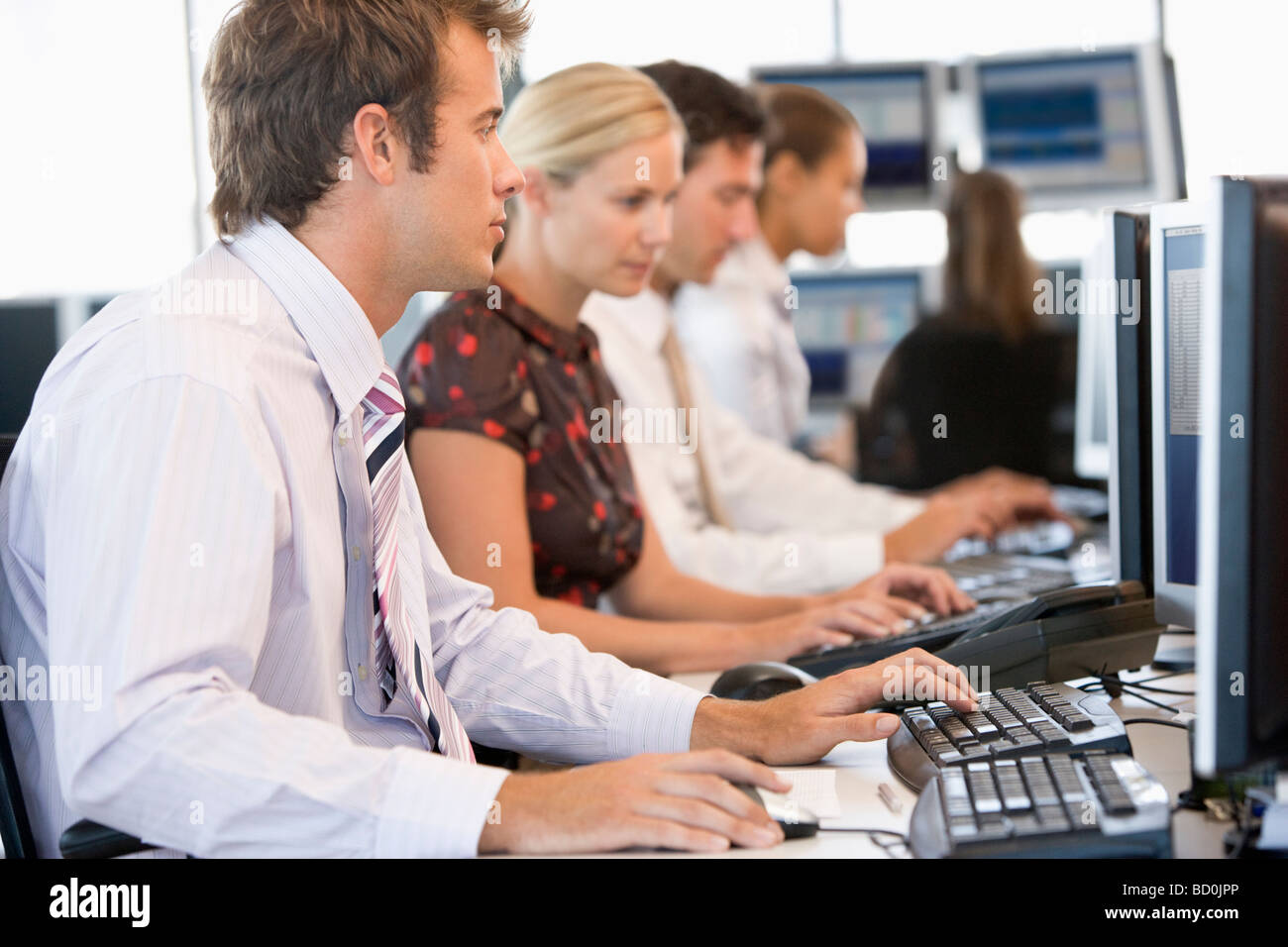 Men row computers hi-res stock photography and images - Alamy