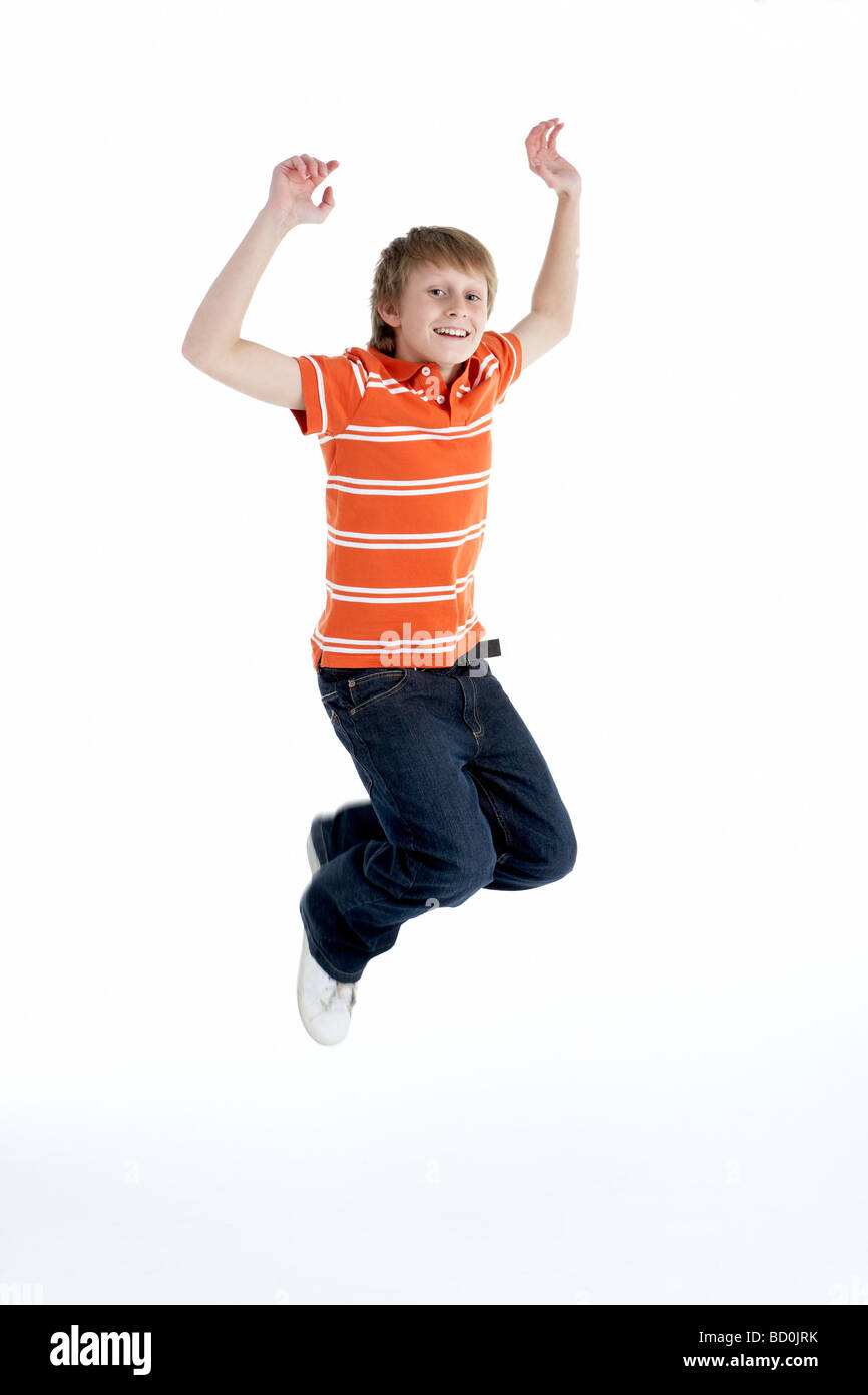Young Boy Jumping In Air Stock Photo - Alamy