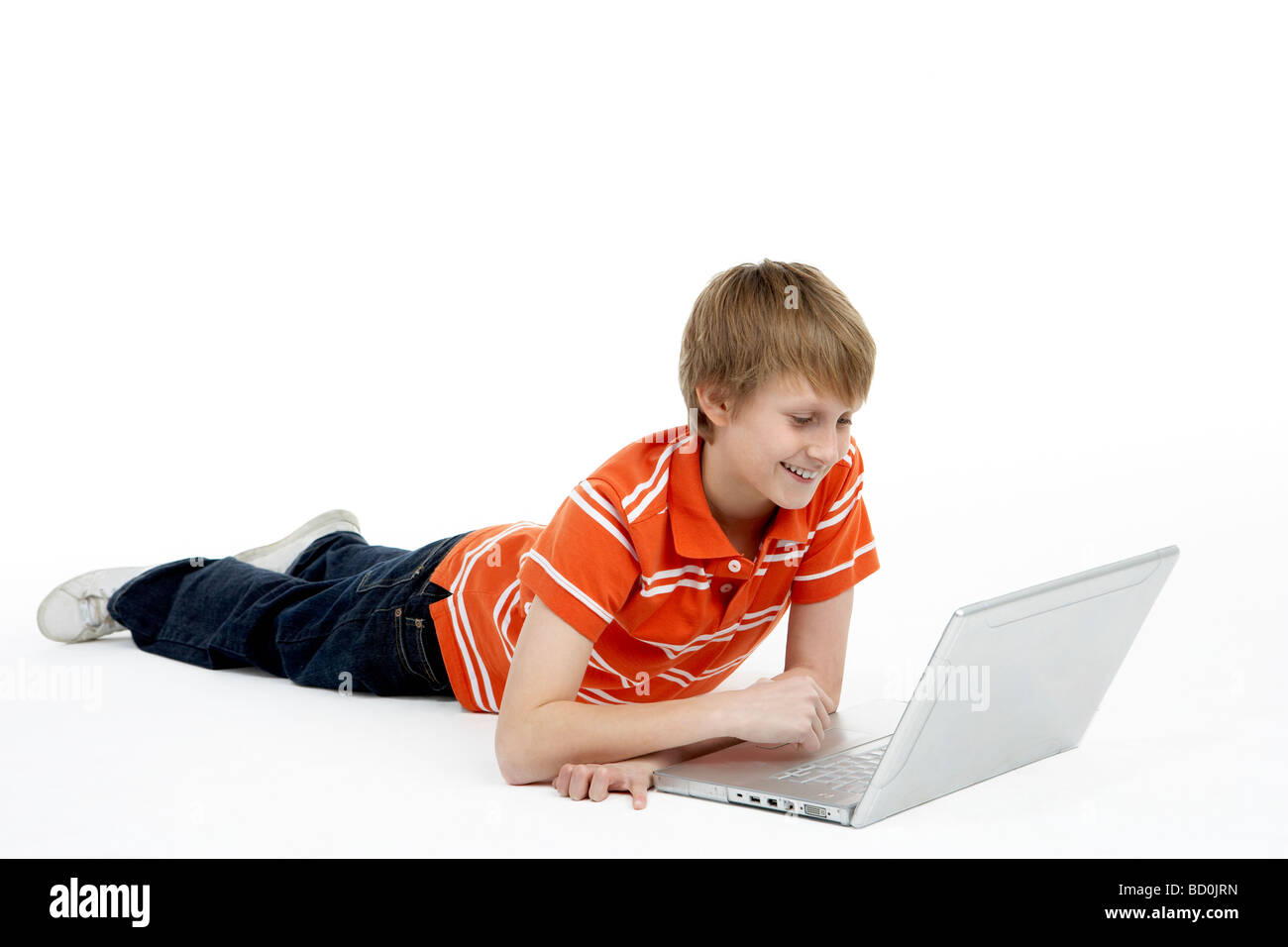 Young Boy Using Laptop Computer Stock Photo - Alamy