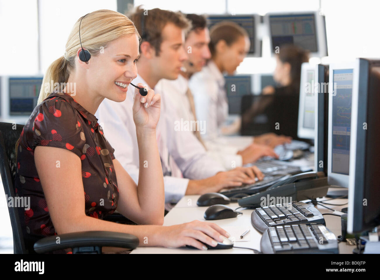 Stock Traders Working At Computers Stock Photo - Alamy