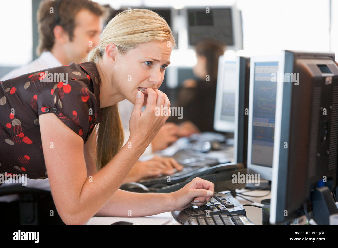 Anxious Woman Looking At Computer Monitor Stock Photo - Alamy