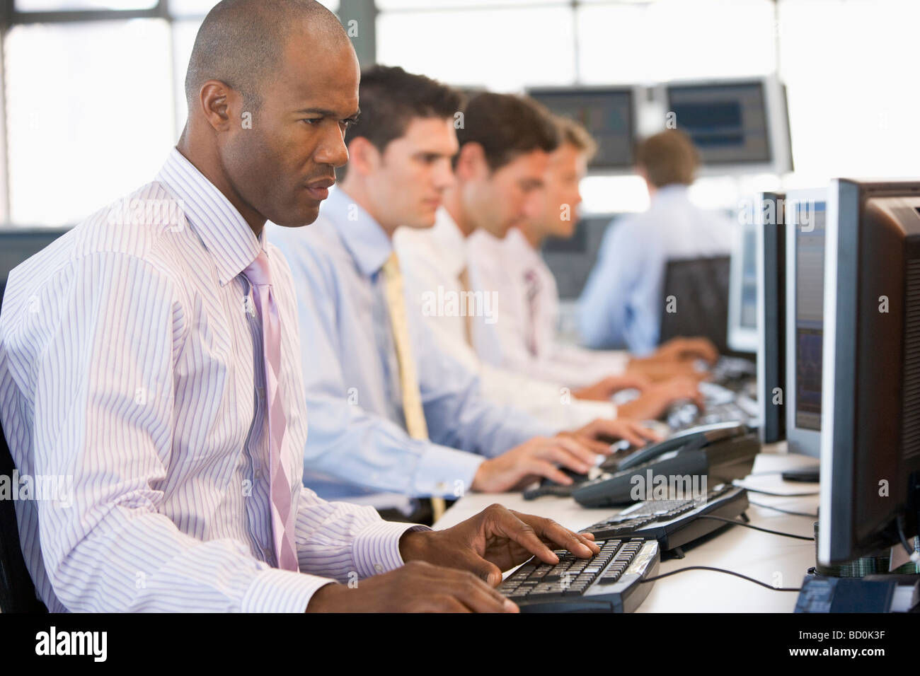 Stock Traders At Work Stock Photo - Alamy