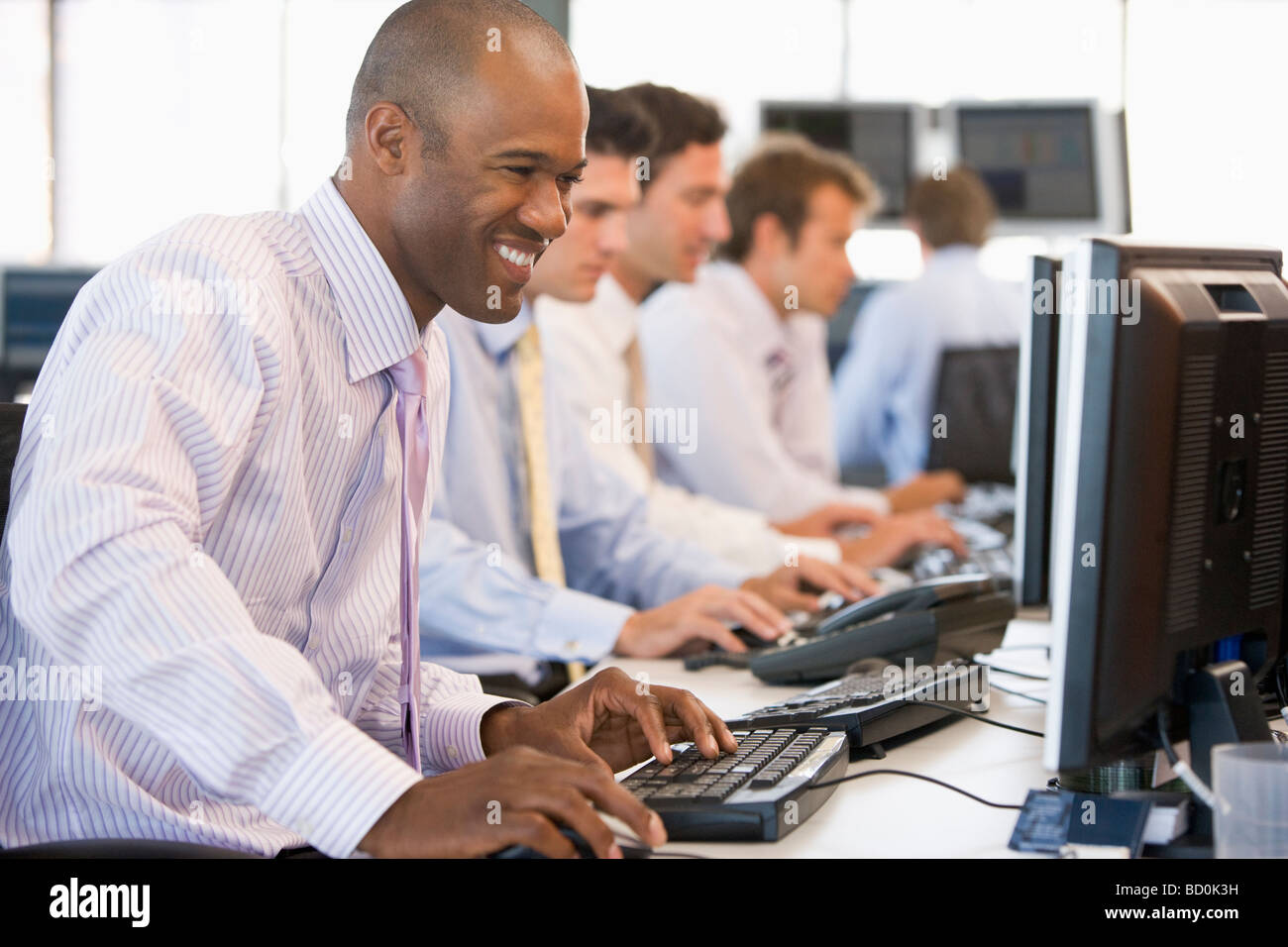 Happy day trader using pc hi-res stock photography and images - Alamy