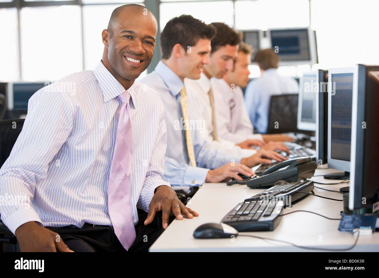Happy day trader using pc hi-res stock photography and images - Alamy