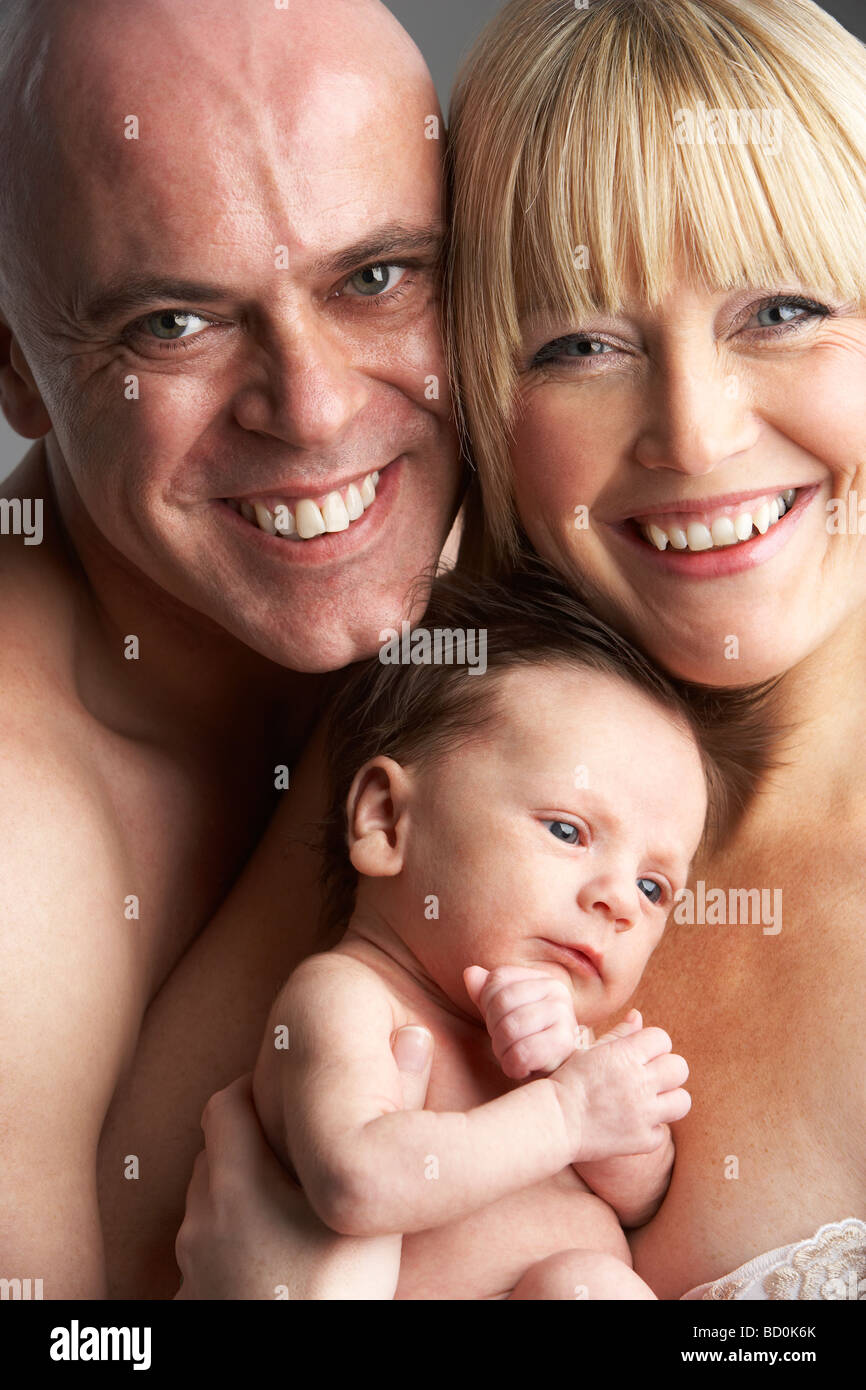 Parents Holding Newborn Baby Stock Photo - Alamy