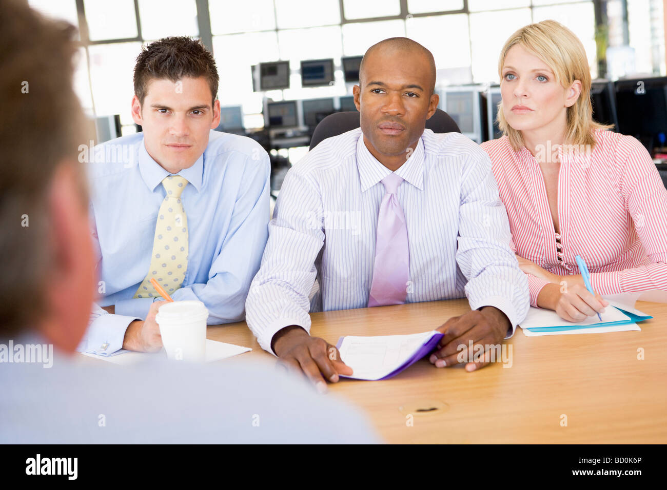 Stock Traders Conducting Interview Stock Photo - Alamy