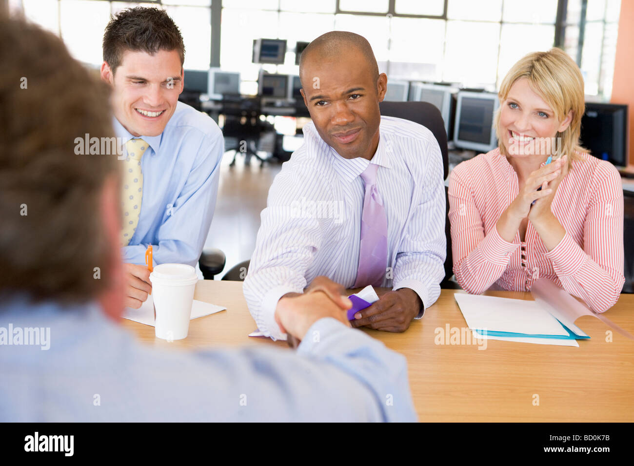 Stock Traders Conducting Interview Stock Photo - Alamy