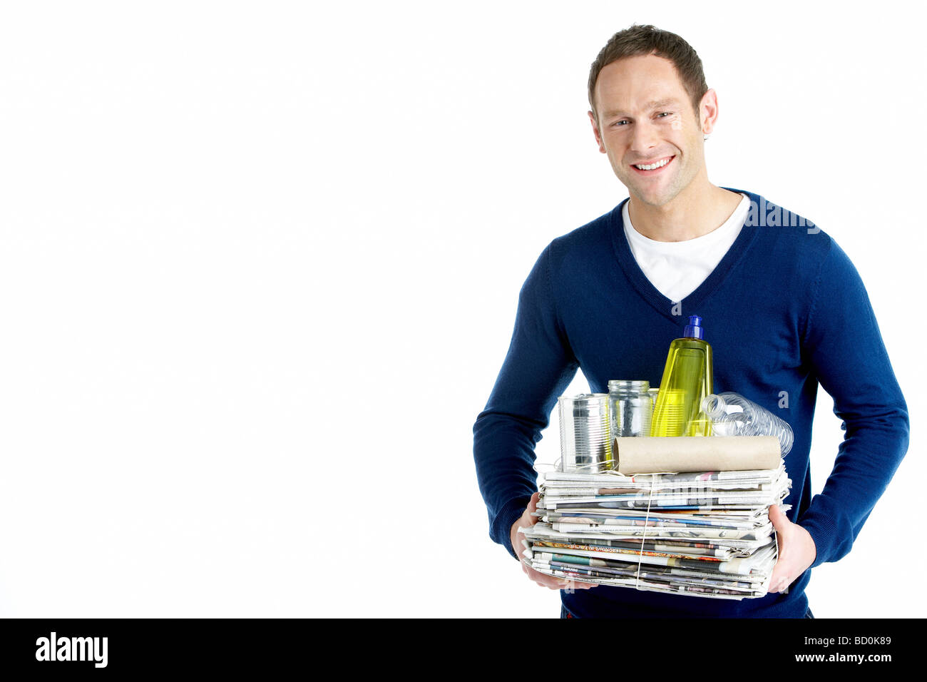 Man Carrying Stack Of Recycling Stock Photo - Alamy