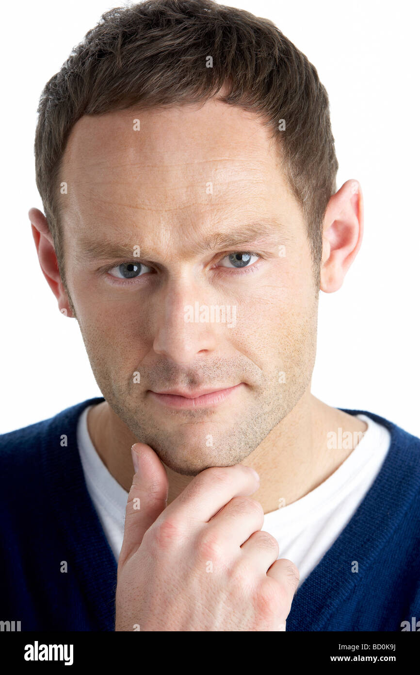 Studio Portrait Of Thoughtful Man Stock Photo - Alamy