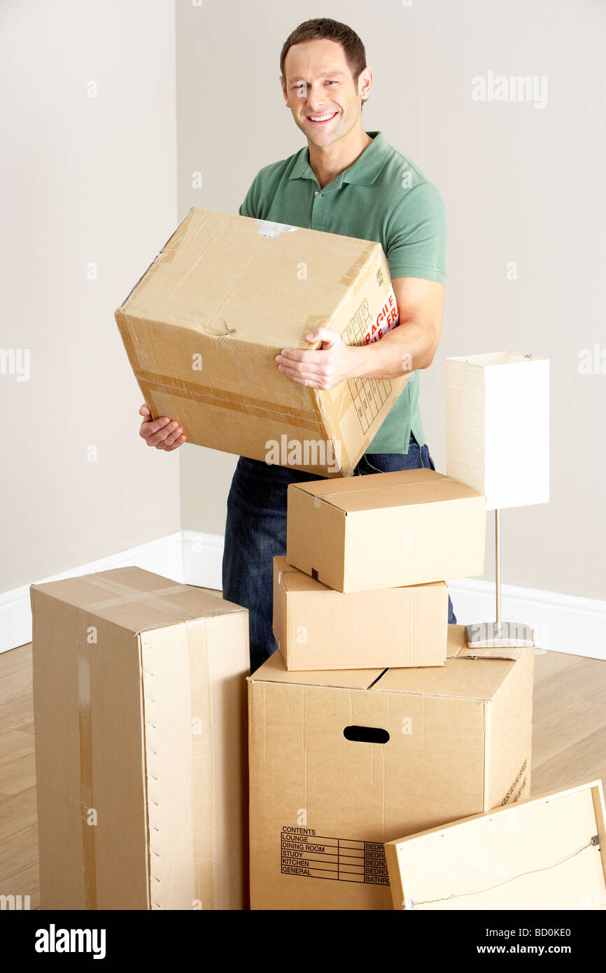Man Moving Into New Home Stock Photo - Alamy
