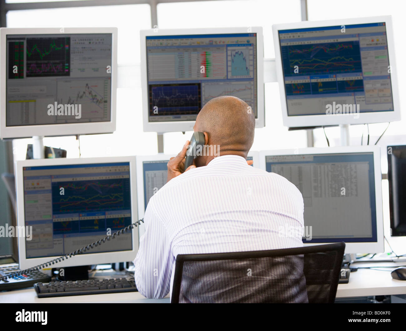 Stock Trader On The Phone Stock Photo - Alamy