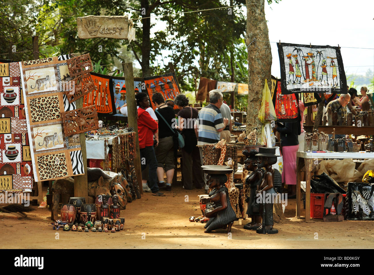 Scene of tourists shopping at craft market in Swaziland travel ...