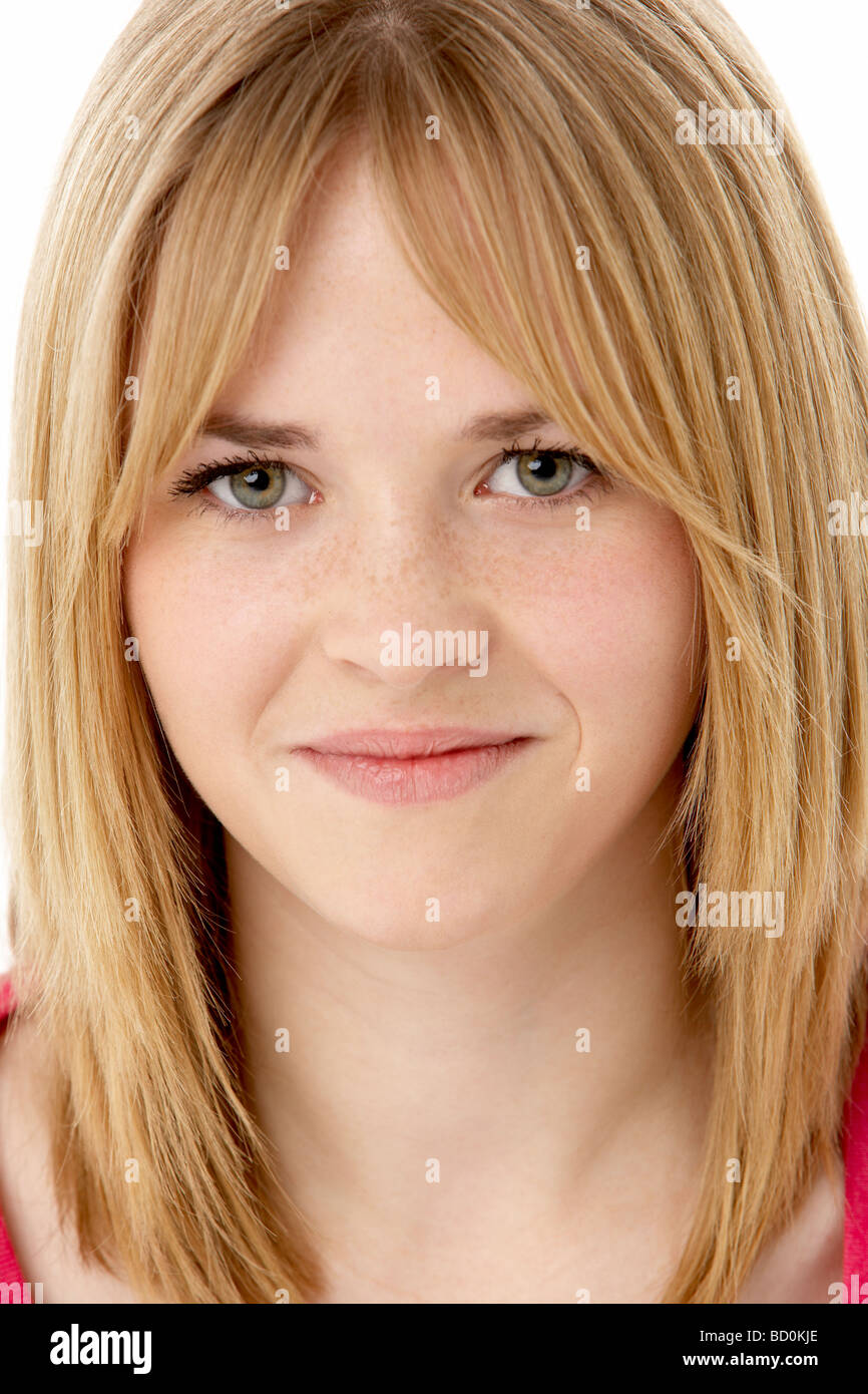 Studio Portrait Of Smiling Teenage Girl Stock Photo - Alamy