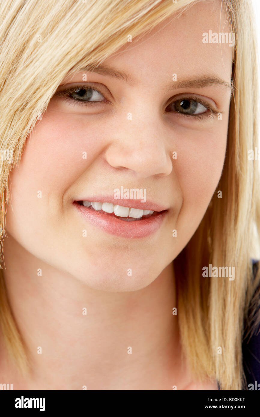 Studio Portrait Of Smiling Teenage Girl Stock Photo - Alamy