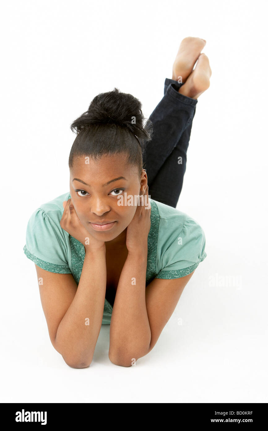 Teenage Girl Laying On Stomach Stock Photo - Alamy