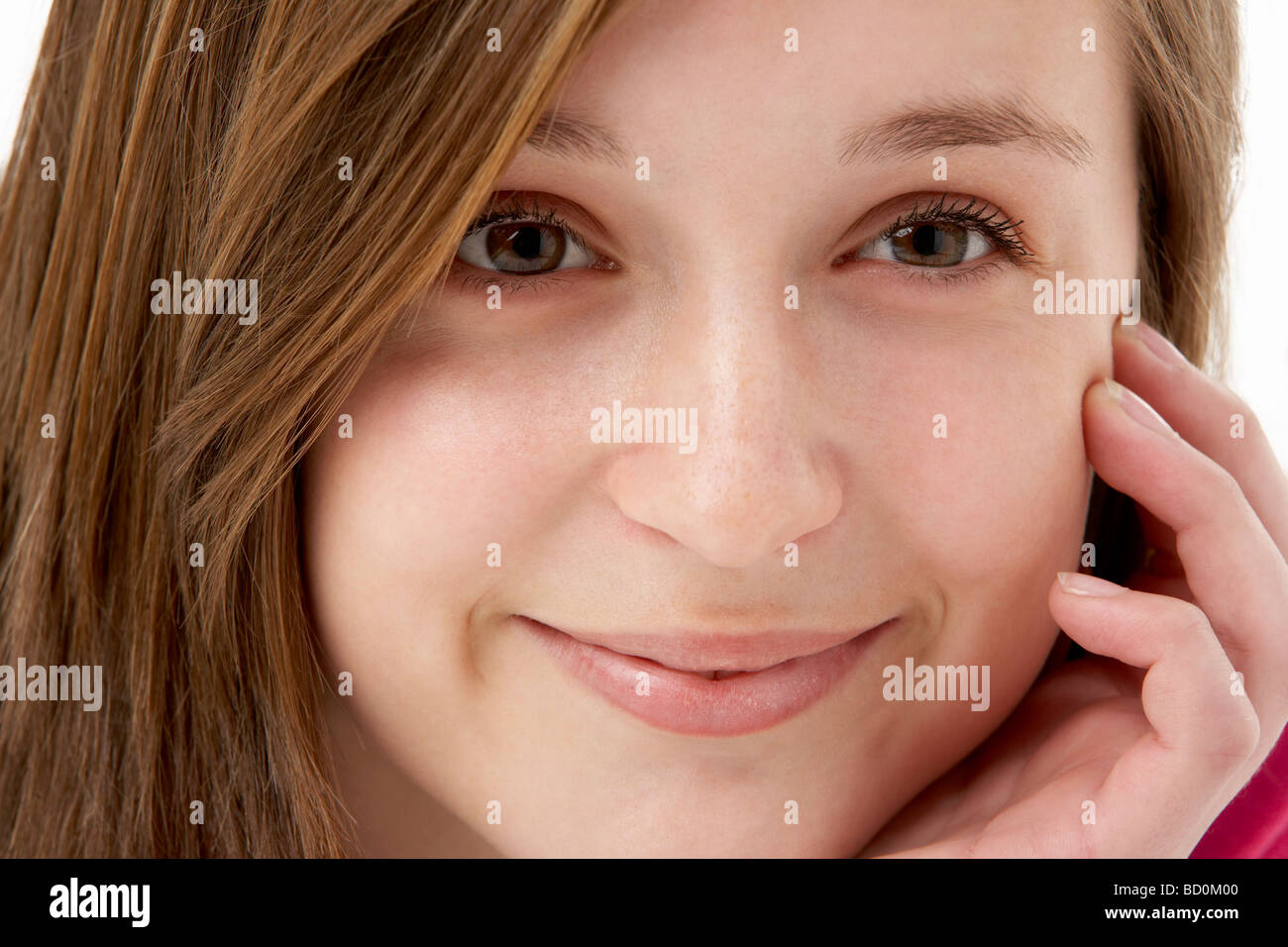 Studio Portrait Of Smiling Teenage Girl Stock Photo - Alamy