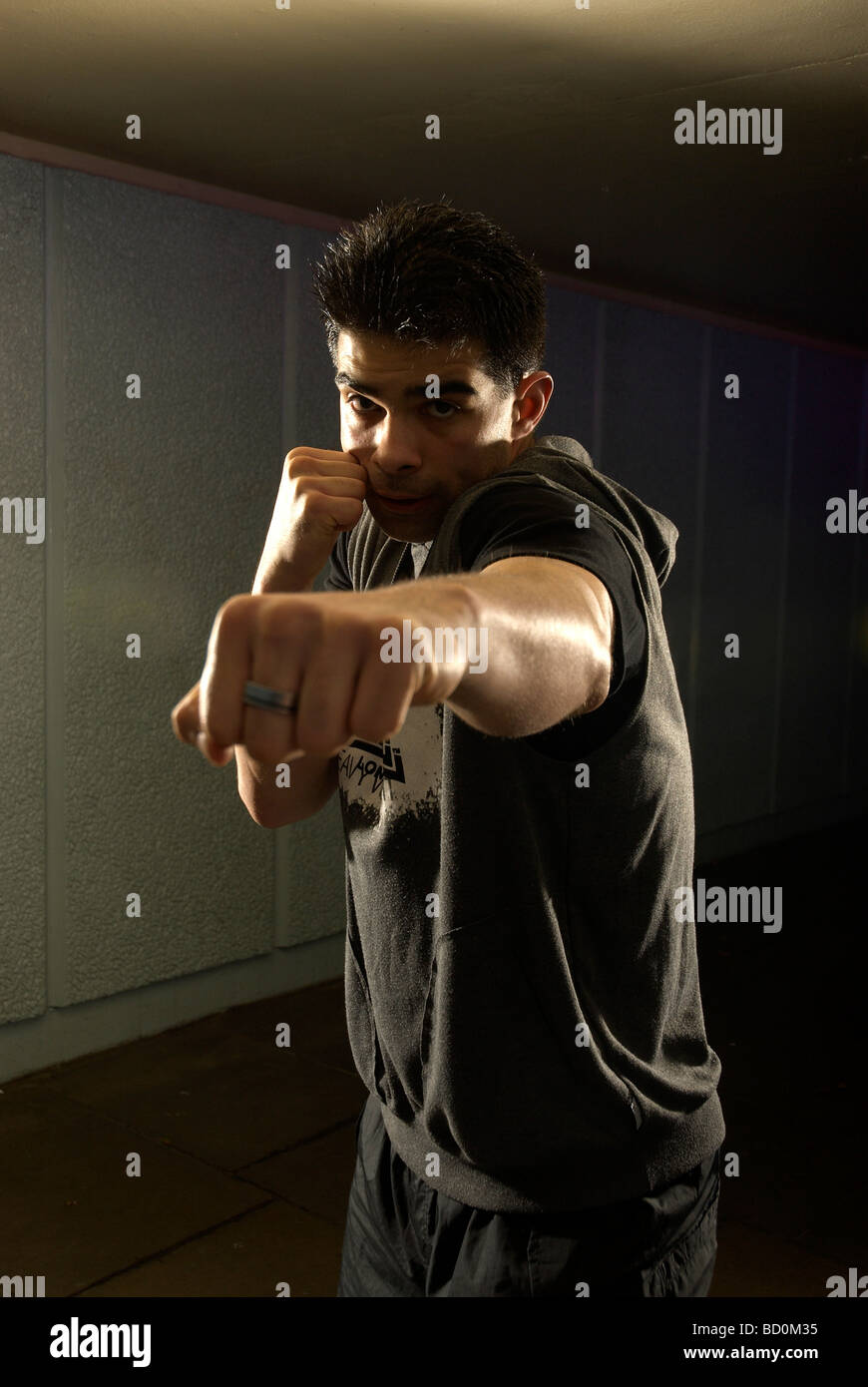 man throwing punch Stock Photo - Alamy