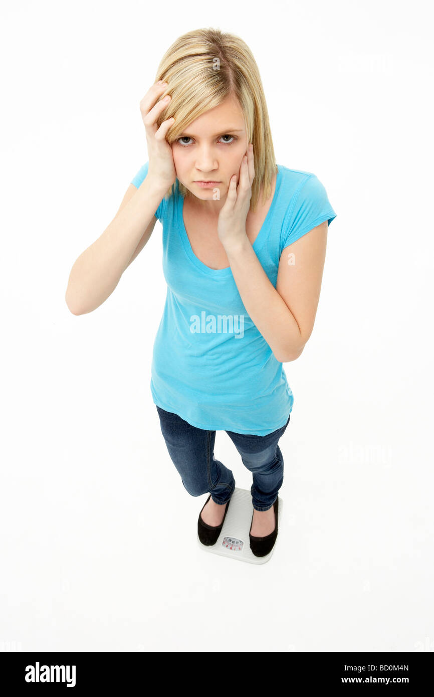 Sad teenager standing Cut Out Stock Images & Pictures - Alamy