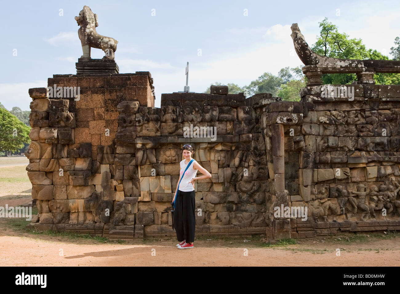 Carved bas relief designs on a temple at Angkor in Cambodia Stock Photo ...