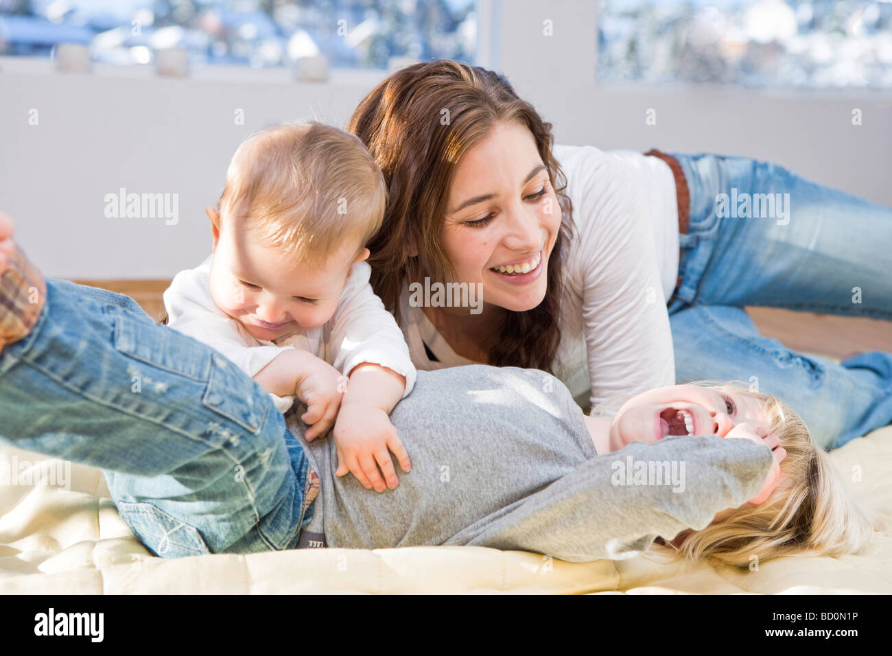 Girl years cuddling baby hi-res stock photography and images - Alamy