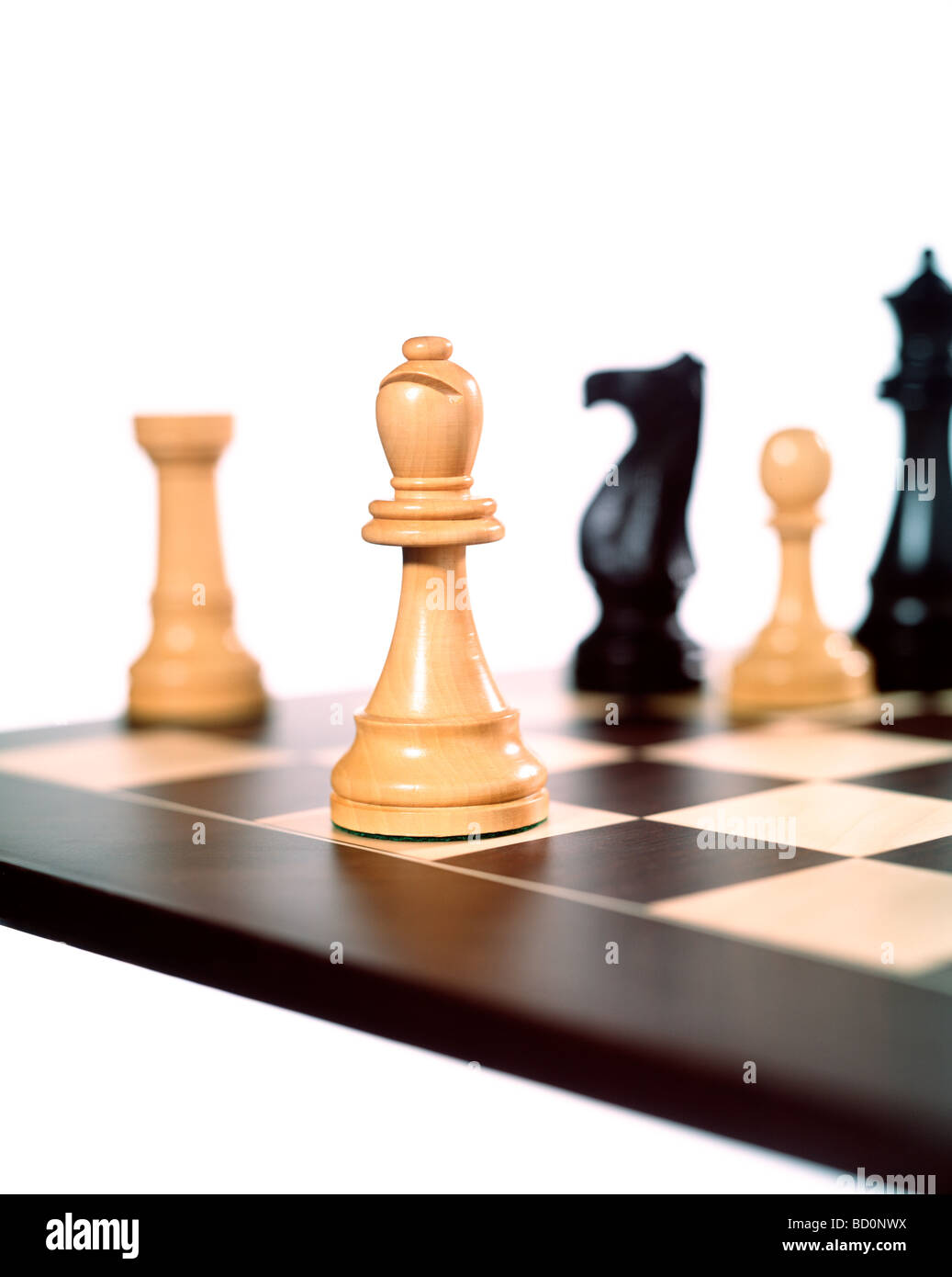 chess board with wooden pieces against white Stock Photo - Alamy