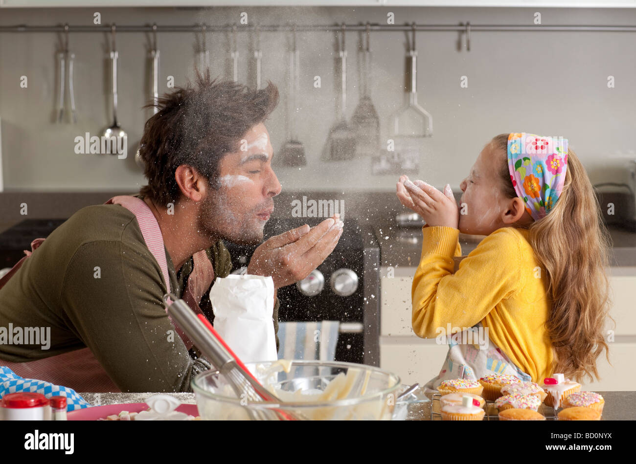 father and daughter cooking Stock Photo - Alamy