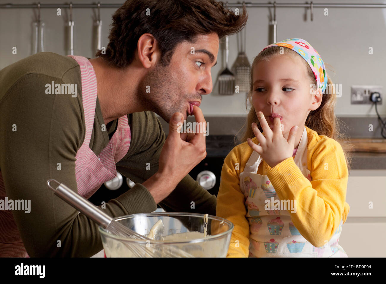 father and daughter cooking Stock Photo - Alamy