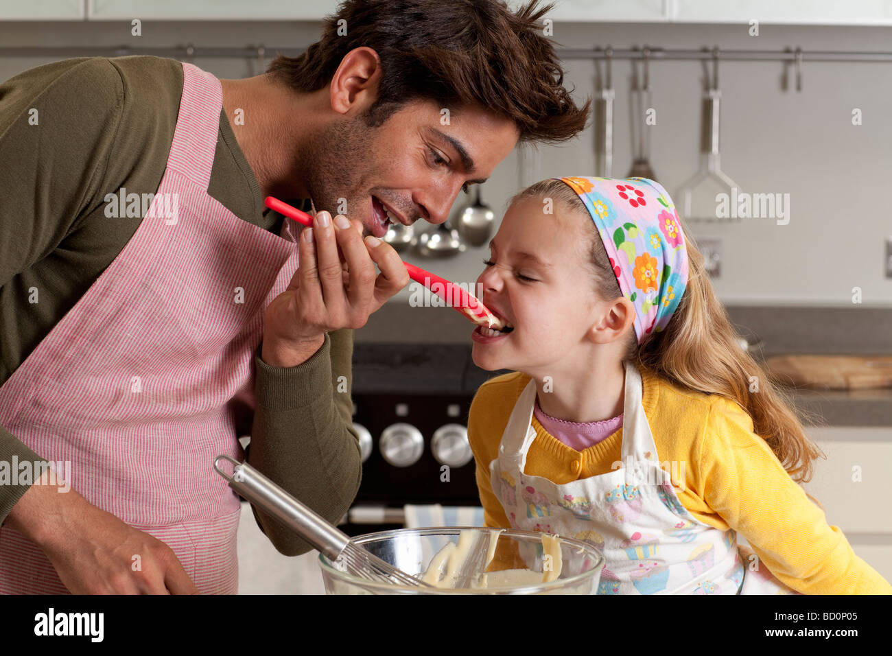 father and daughter cooking Stock Photo - Alamy