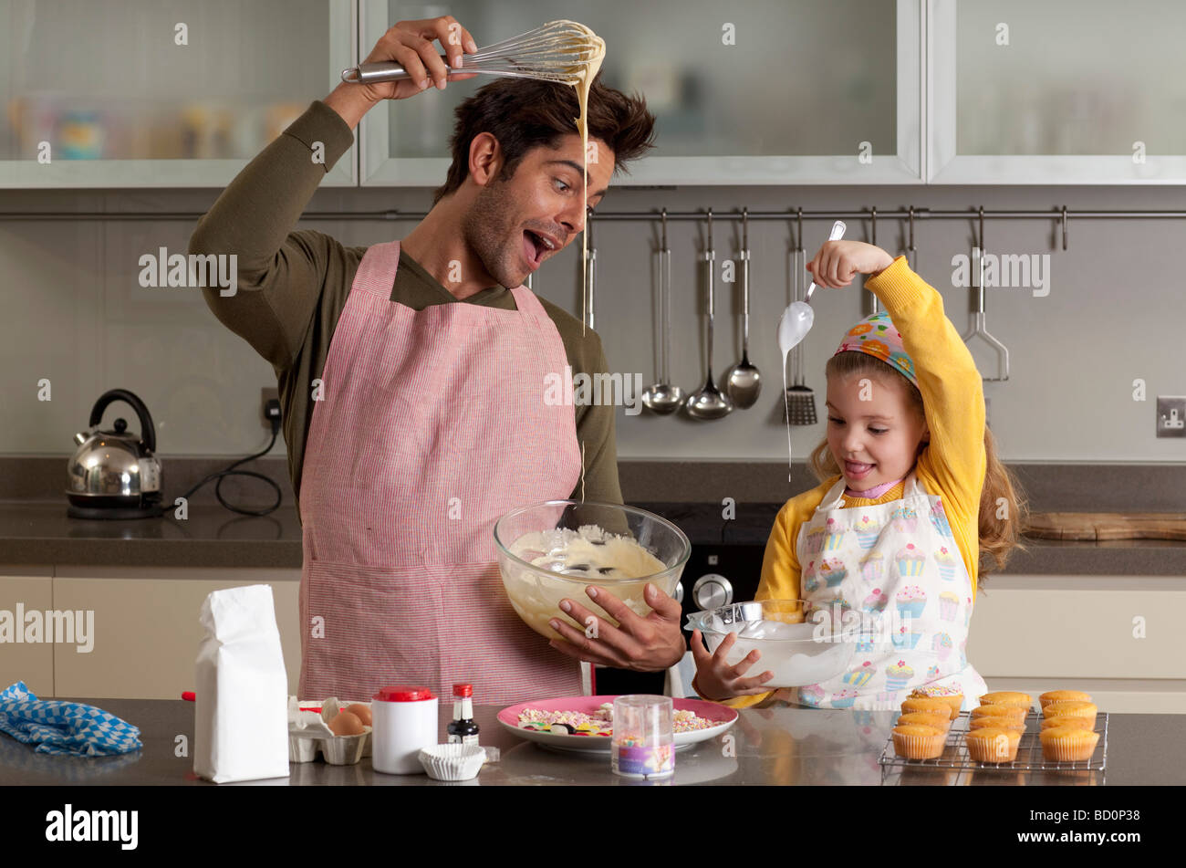 father and daughter cooking Stock Photo - Alamy