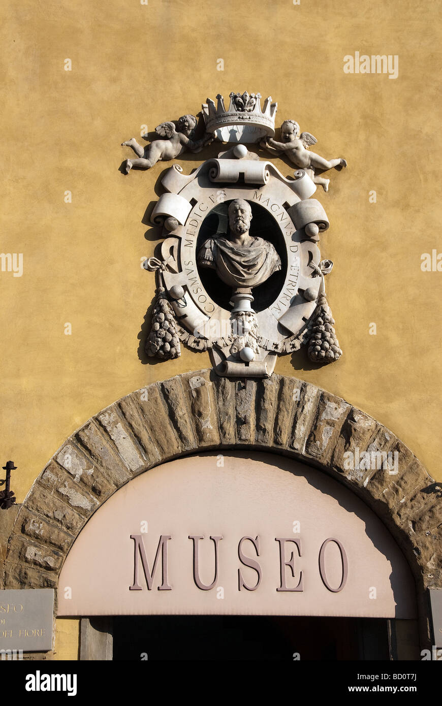 The museum of the Opera del Duomo entrance with the bust of Cosimo I di ...
