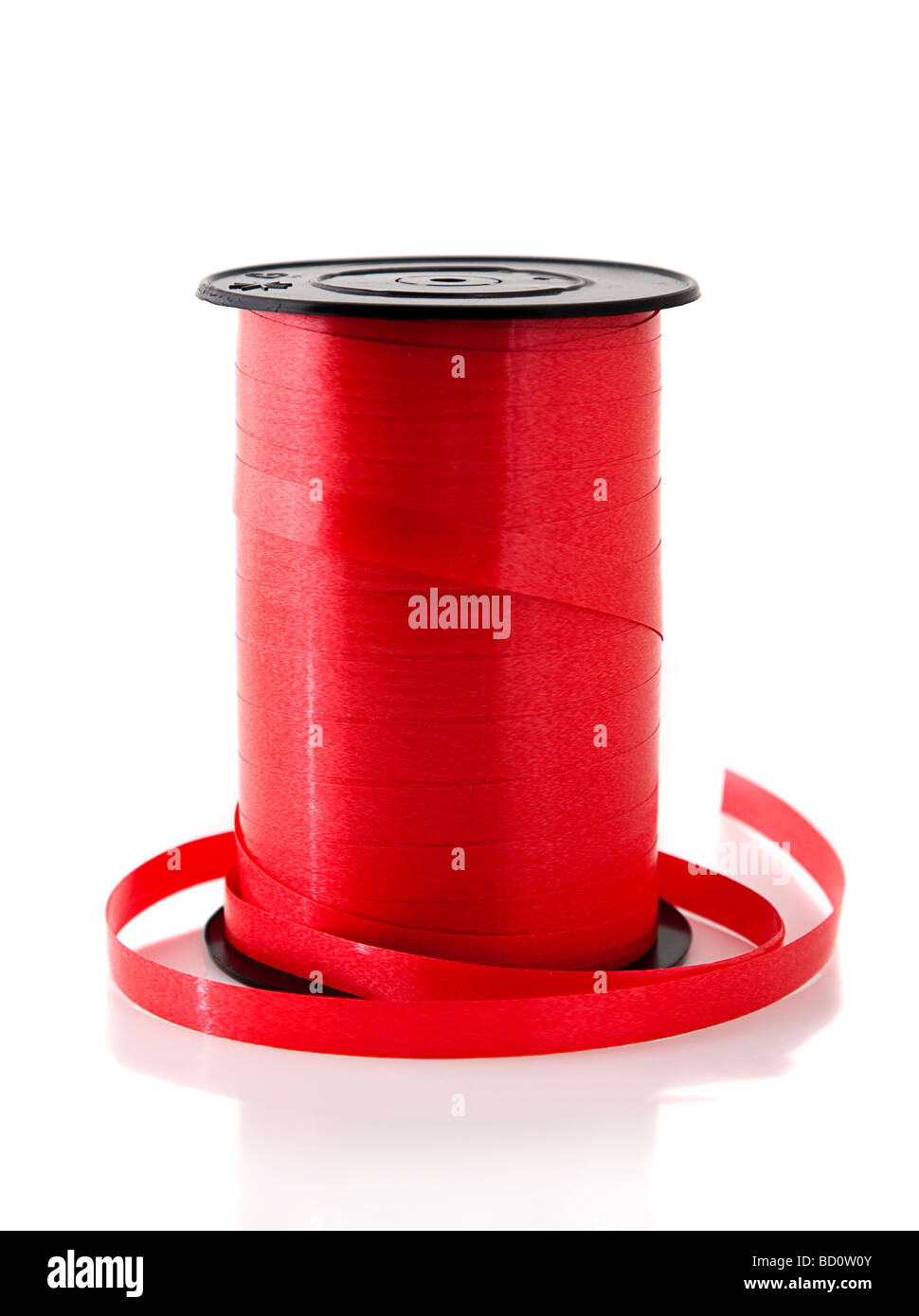 Roll of red ribbon Stock Photo - Alamy