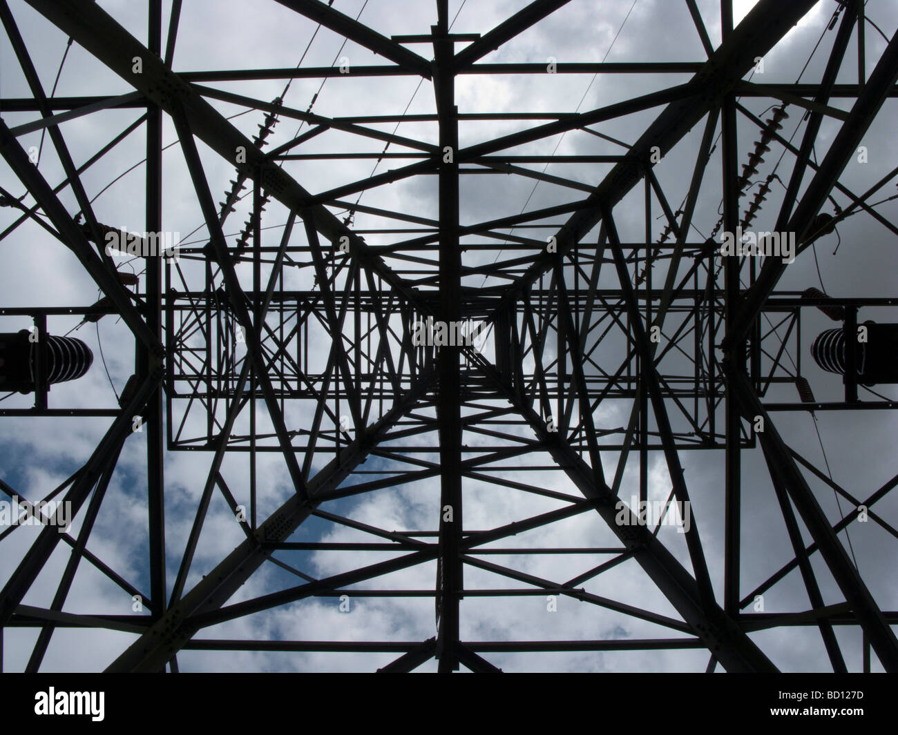 looking up at a electrical pylon Stock Photo - Alamy