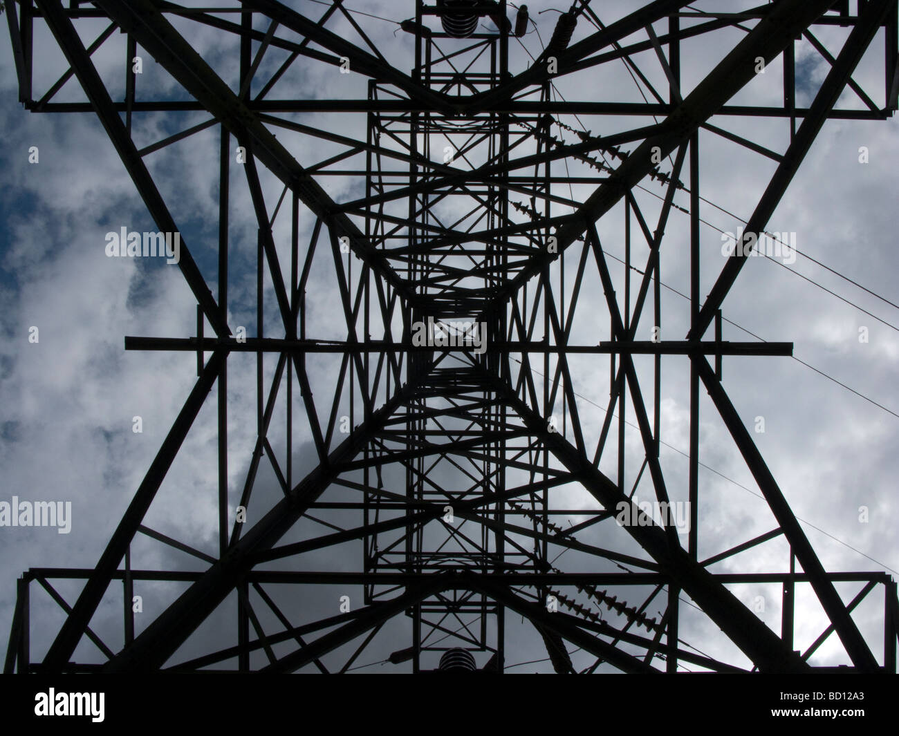 looking up at a electrical pylon Stock Photo - Alamy