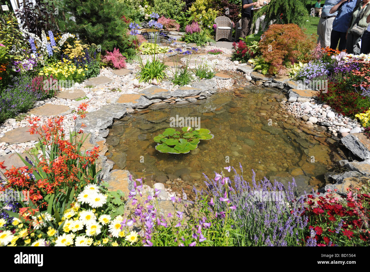 Water feature in a show garden at the RHS Flower show at Tatton Park ...