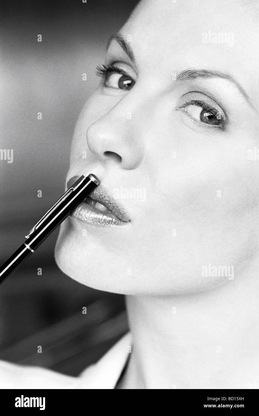 Pen on lip hi-res stock photography and images - Alamy