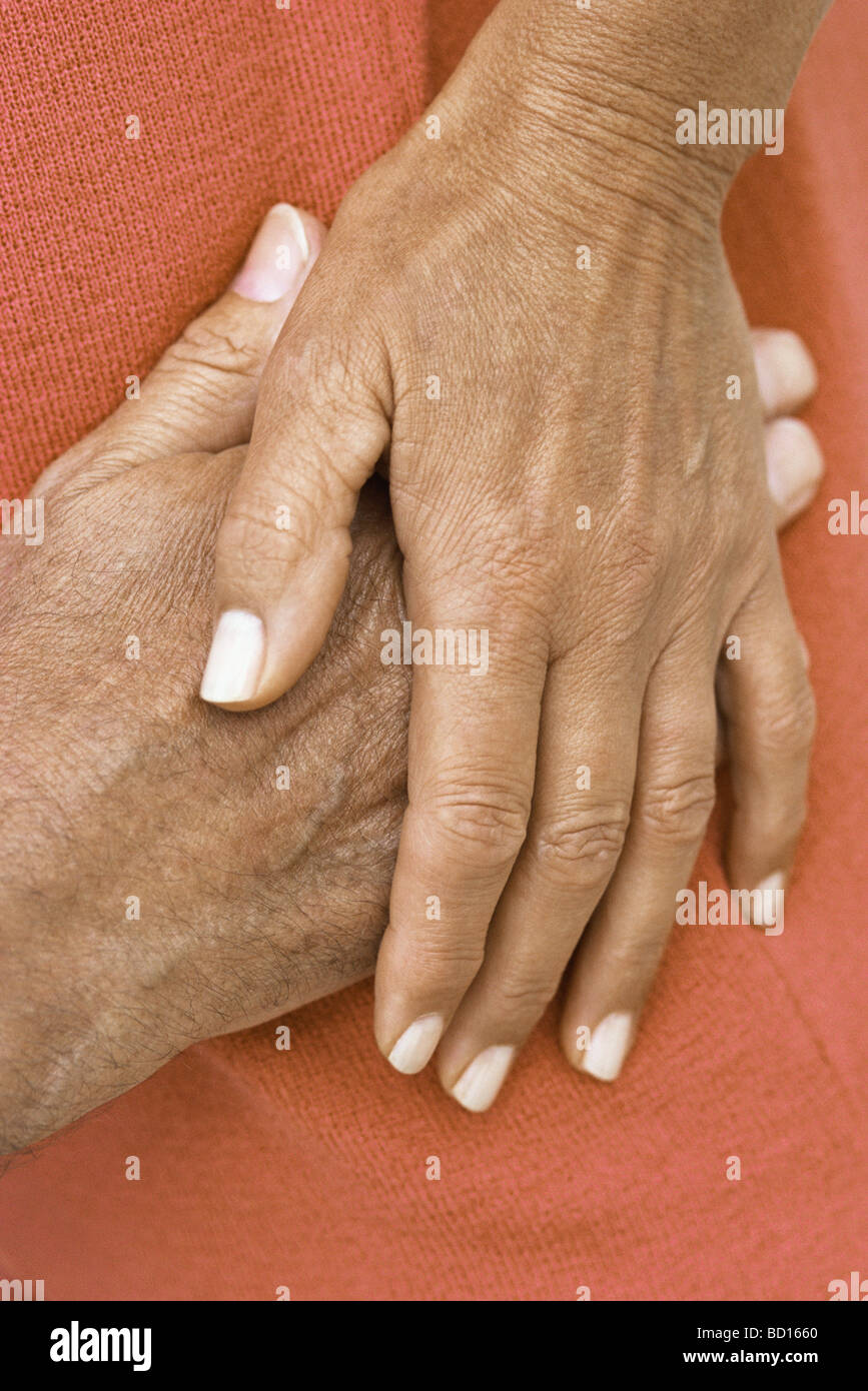 Man clasping womans hands hi-res stock photography and images - Alamy