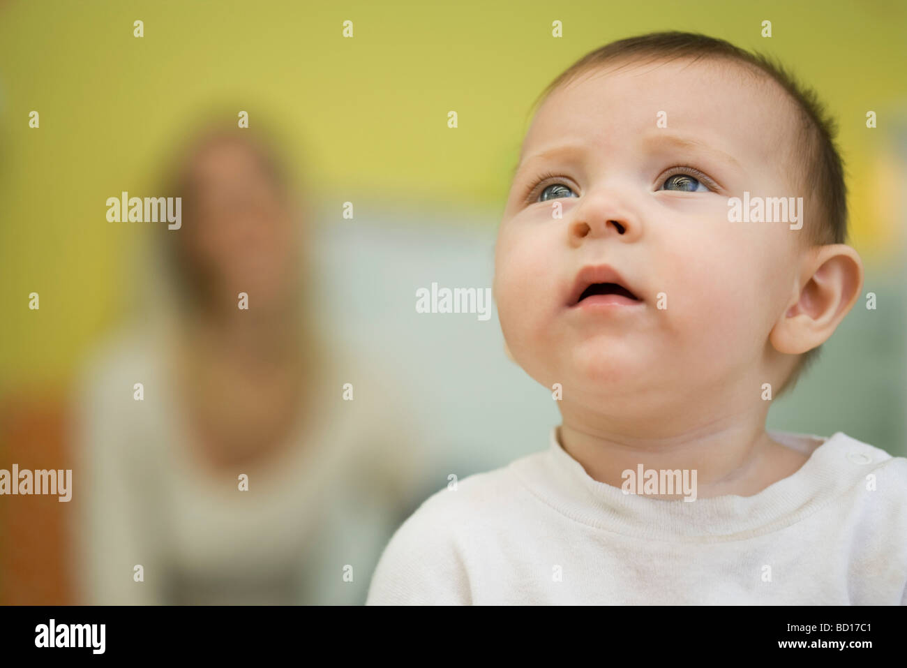 Baby looking up Stock Photo - Alamy