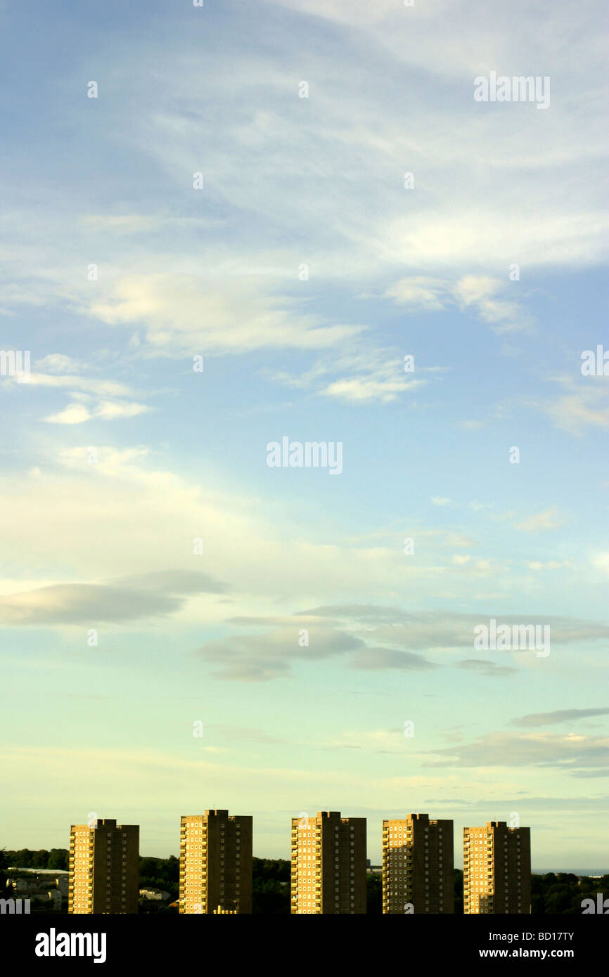 Cloudy sky and buildings Stock Photo - Alamy