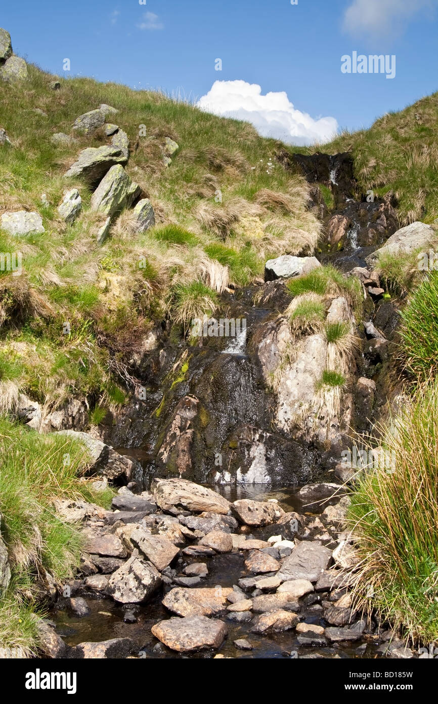 Water tumbling over the rocks Stock Photo - Alamy