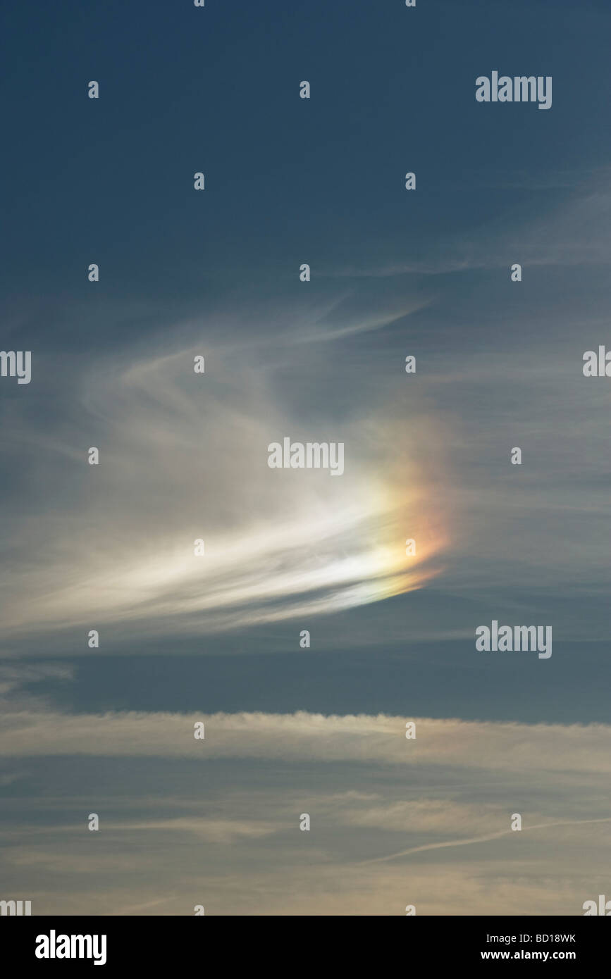 Cloudscape with partial rainbow Stock Photo - Alamy