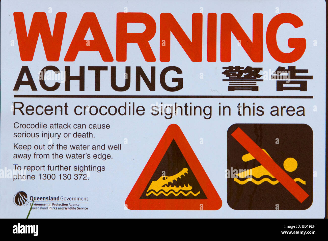 Crocodile warning sign Stock Photo - Alamy