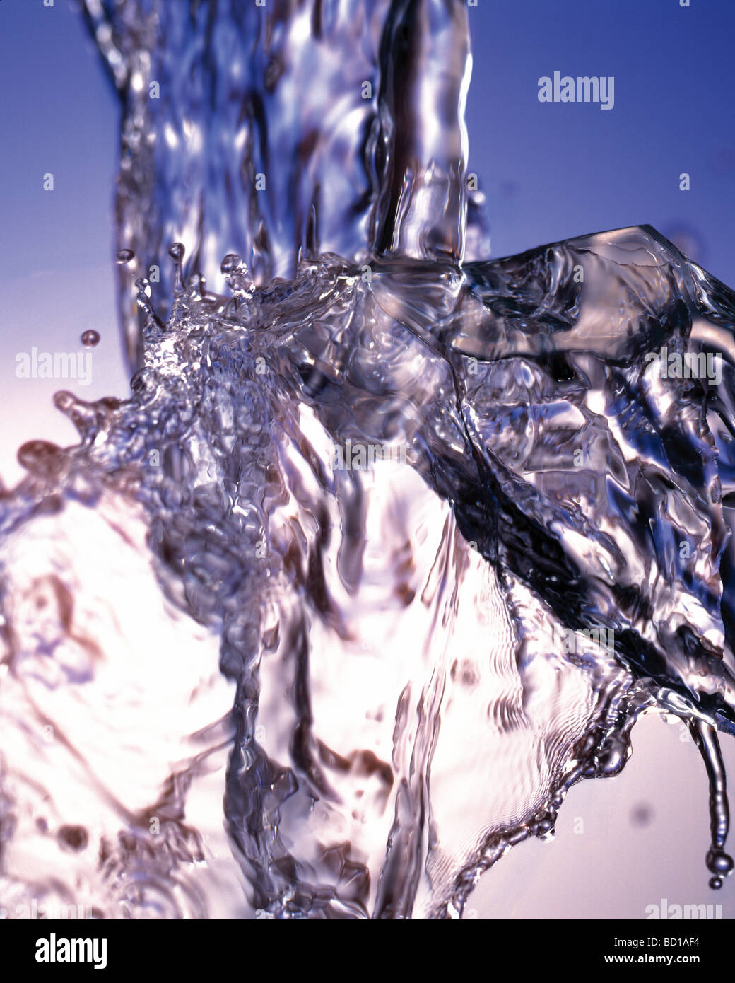 Running water close up white background Stock Photo - Alamy