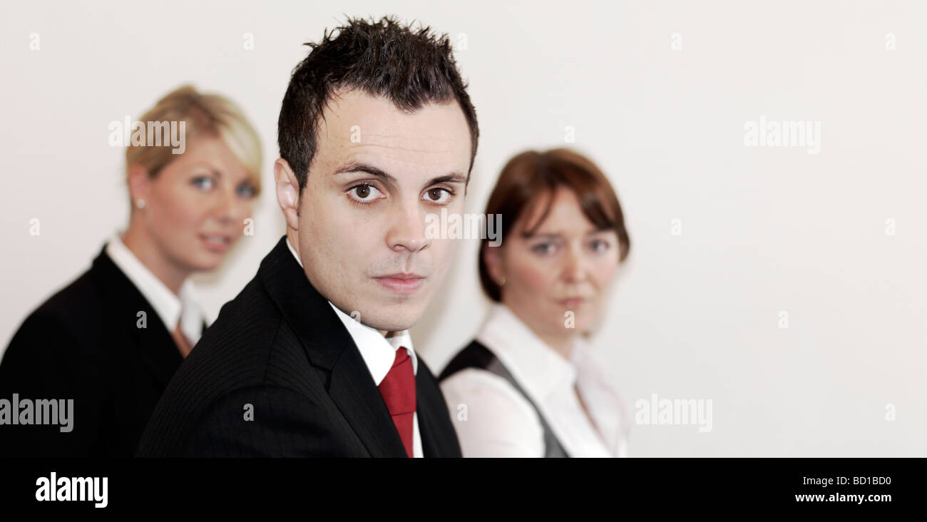 three young business people portrait Stock Photo - Alamy