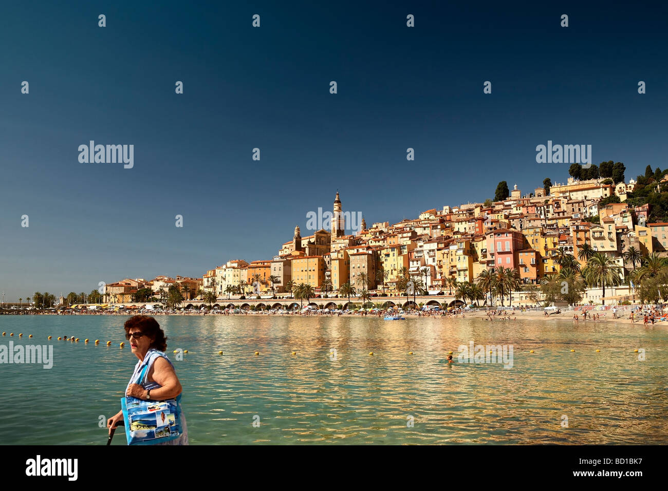 Local in front of old town Menton French Riviera Provence Alpes Cote d ...