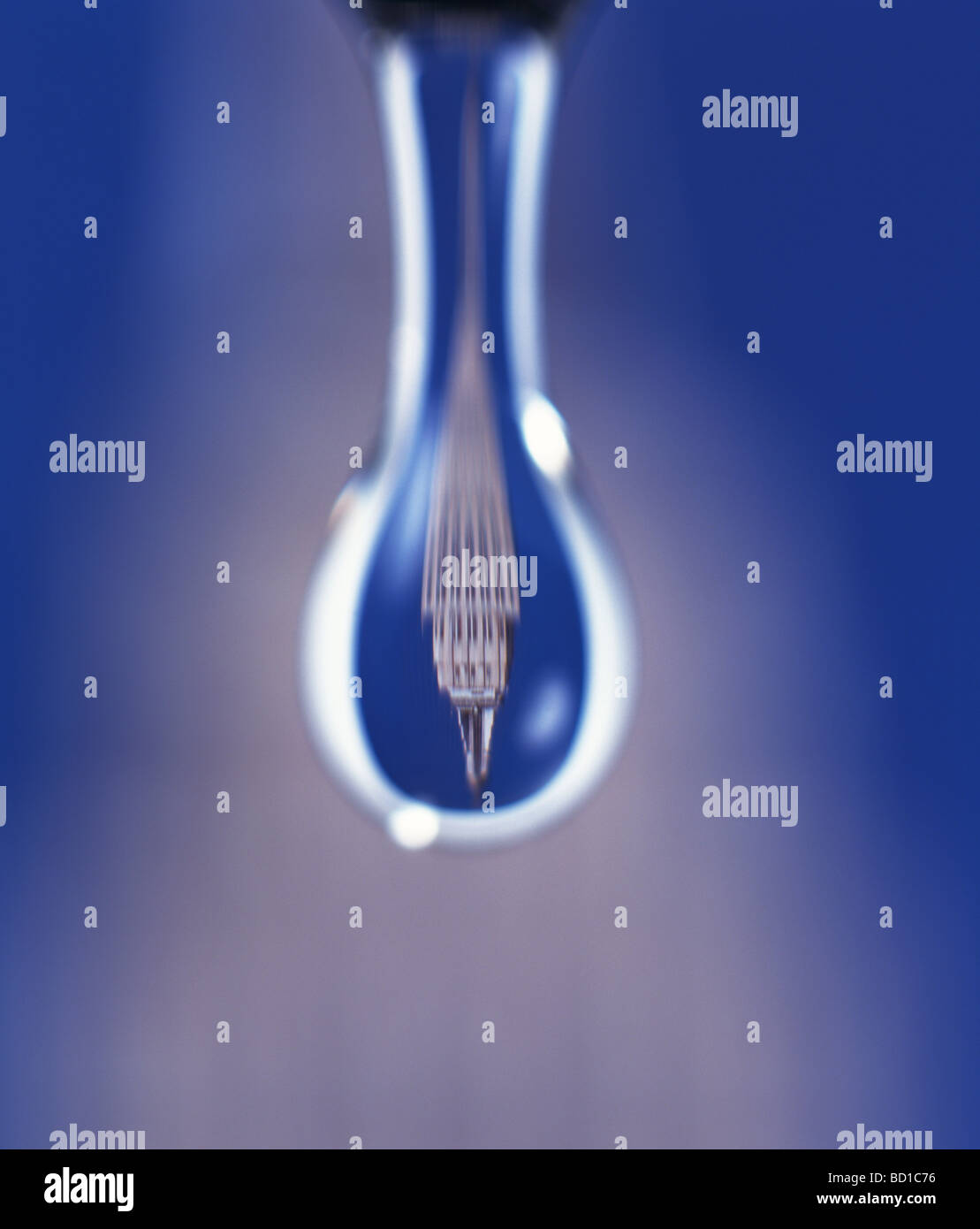 Building reflected on water droplet Stock Photo - Alamy