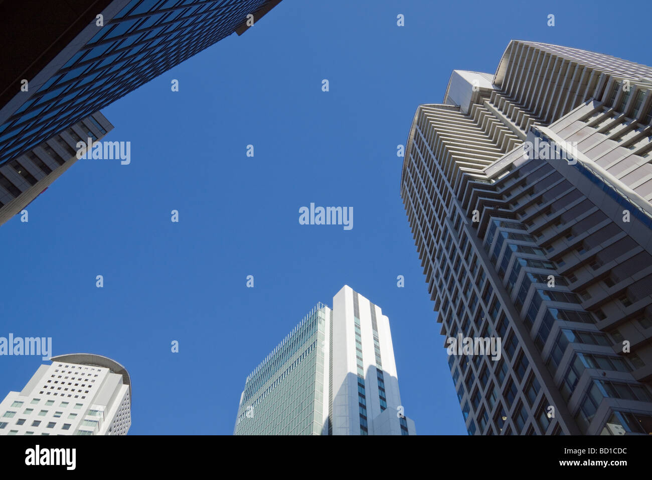 Tall Buildings and Blue Sky Stock Photo - Alamy
